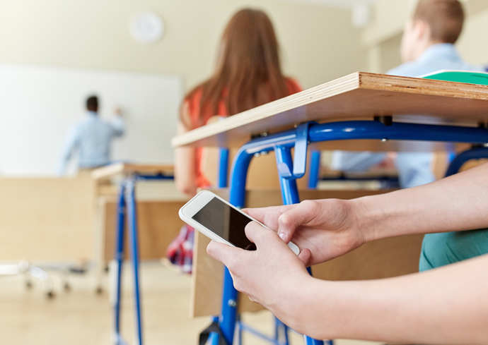 Faculty Experts Debate the Benefits of Banning Cell Phones in Schools ...